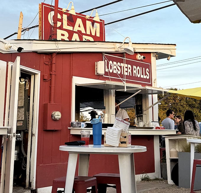 Red and white simplicity speaks volumes - sometimes the humblest shacks serve the most memorable meals.
