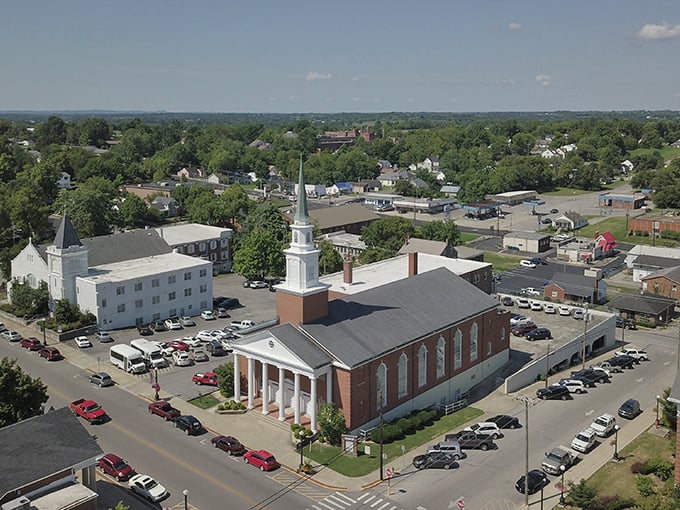 The stately architecture and surrounding structures create a perfect small-town square that feels both timeless and welcoming.