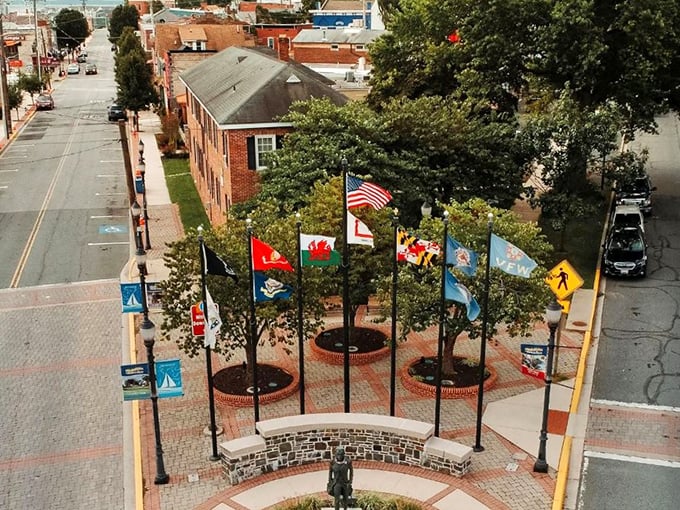 A quiet corner where brick, breeze, and banners meet—proof that even small towns can fly big dreams.