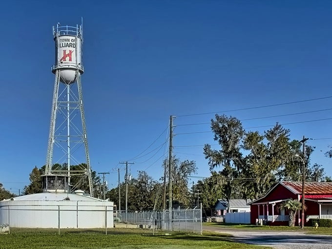 That water tower stands tall like a lighthouse, guiding retirees home to affordable living and genuine community.