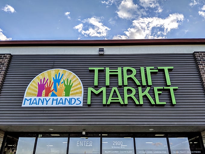 The colorful logo says it all—Many Hands working together to create a thrift experience that feels more boutique than bargain basement.
