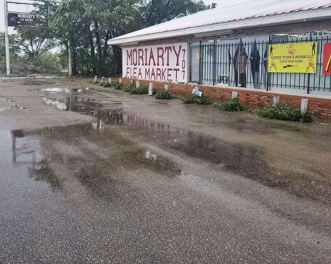Even rainy days can't dampen the treasure-hunting spirit at Moriarty Flea Market, where puddles reflect the promise of undiscovered gems.