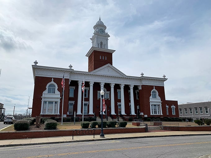 Historic charm meets Southern pride – the iconic courthouse in downtown Opelika, Alabama, standing tall as a symbol of tradition and community.