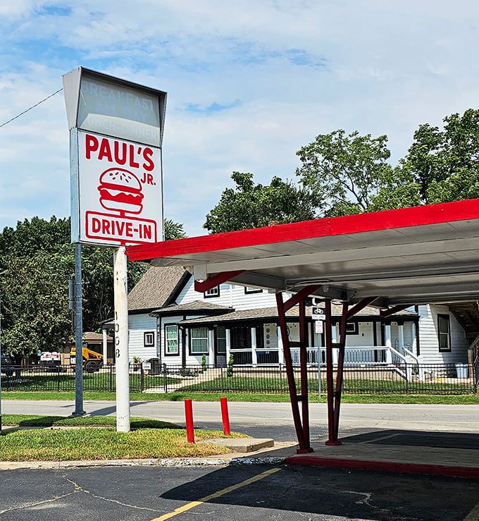 This timeless drive-in setup delivers pure nostalgia alongside perfectly grilled hot dogs that taste like childhood memories.