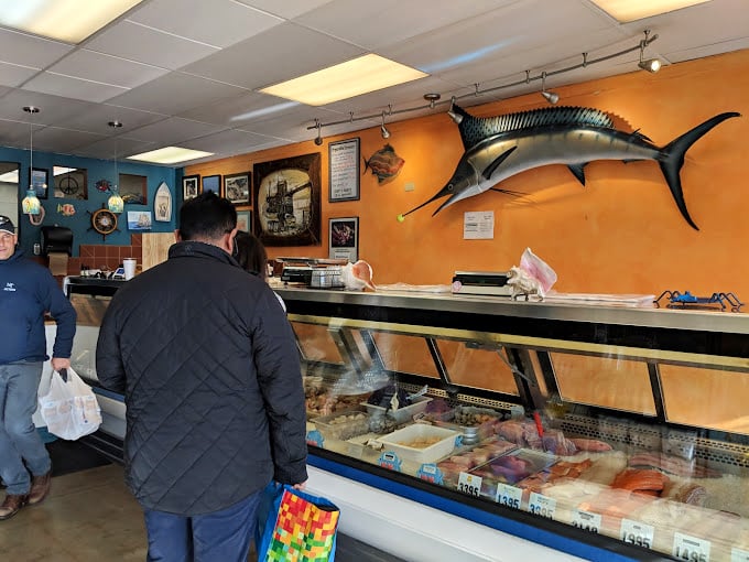 That mounted swordfish on the wall has seen more fresh catches than most coastal restaurants.