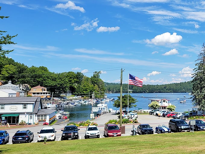 Sunapee's waterfront vista captures the essence of lake life – boats bobbing gently while mountains stand guard in the distance.