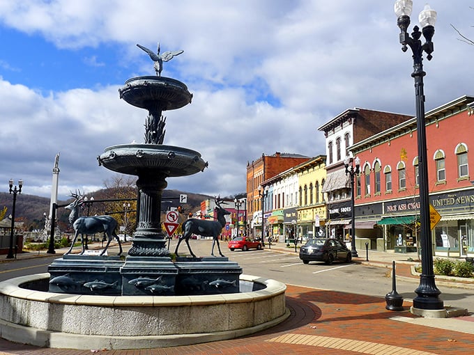 A fountain with deer and angels—part sculpture, part storybook—standing proudly as the town’s own little Broadway star.