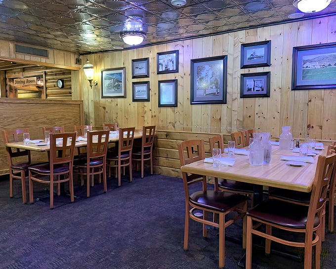 The dining room's rustic elegance says "stay awhile"—these wooden walls have witnessed countless birthday celebrations, anniversaries, and first dates.
