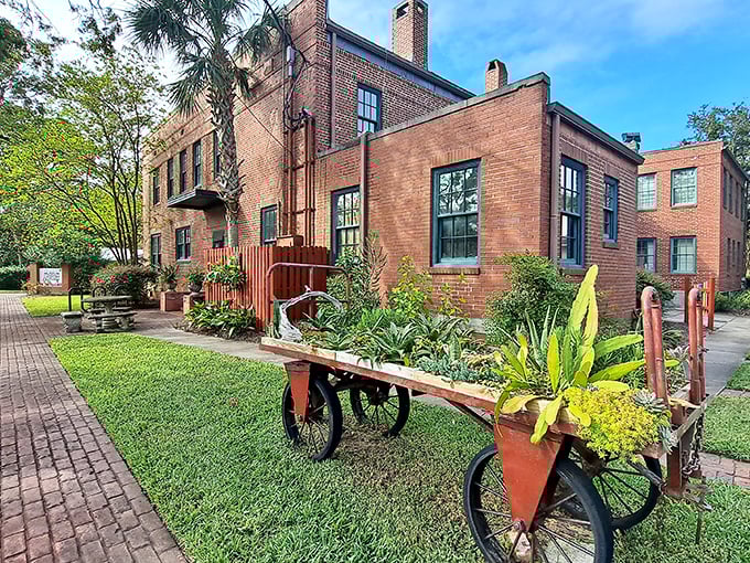 The Amelia Island Museum of History proves that brick buildings and lush gardens make perfect companions. That vintage wheelbarrow isn't just decorative—it's transported generations of stories.