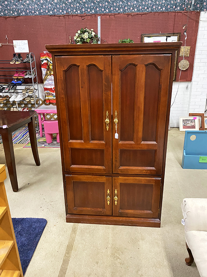 This stately armoire isn't just furniture – it's a time machine to when craftsmanship mattered more than assembly instructions.