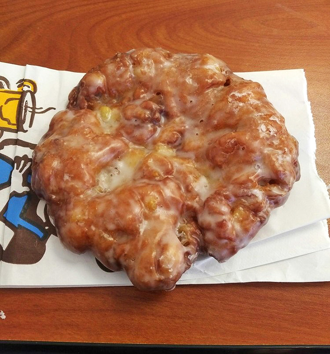 That apple fritter is basically a map of deliciousness, with glaze rivers flowing through apple territory.