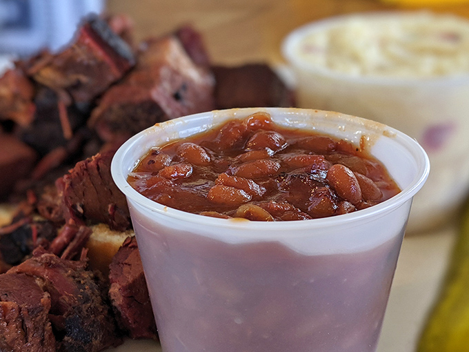 These aren't your average baked beans—they're smoky, meaty little flavor bombs that refuse to accept their "side dish" status quietly.