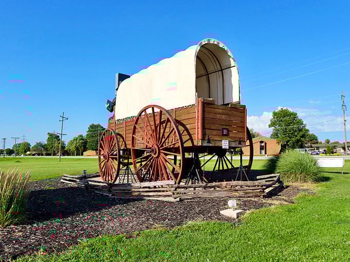 The back view reveals the wagon's impressive scale. Those wheels aren't just for show—they're engineering marvels that would make any wheelwright weep with joy.