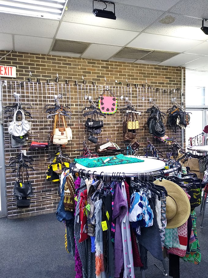 Handbag heaven against exposed brick—architectural honesty meets fashion functionality. That watermelon-shaped purse is someone's future conversation starter.