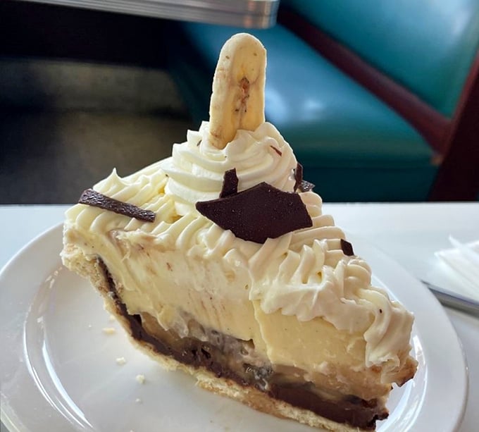 This banana cream pie doesn't just satisfy a sweet tooth—it creates a core memory. Layers of flavor that would make a pastry chef weep with joy.