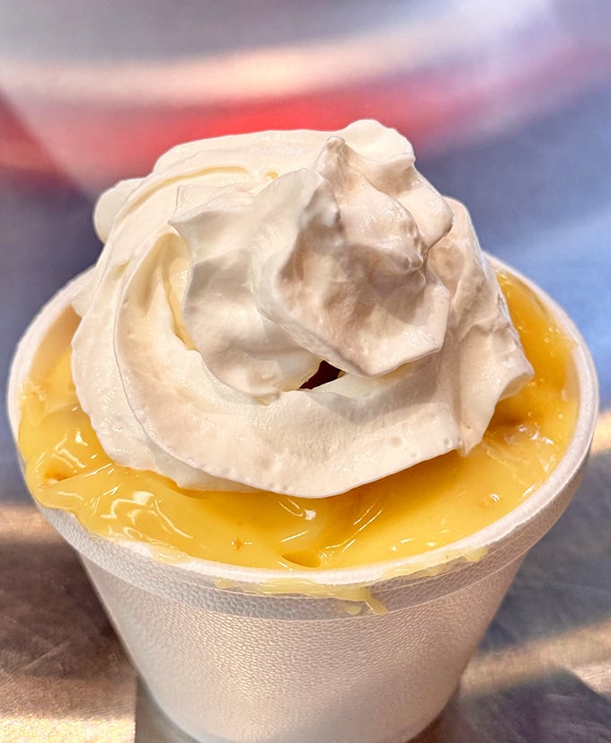 Banana pudding crowned with a cloud of meringue—the kind of dessert that makes you consider skipping the main course next time.