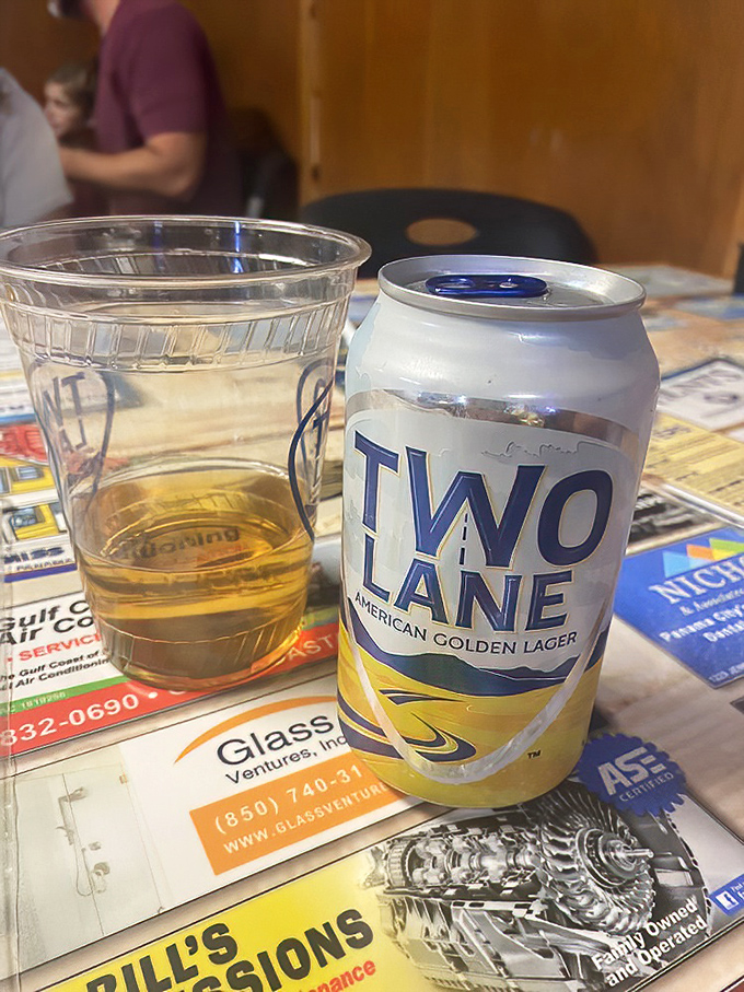 A cold beer in an unpretentious plastic cup – the perfect companion to seafood that needs no fancy stemware to elevate the experience.