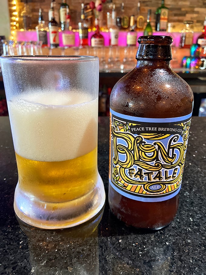 A frosty local brew from Peace Tree Brewing—because nothing tames Cajun heat like Iowa craft beer in a properly chilled glass.