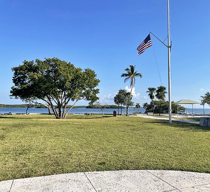 An American flag waves lazily in the sea breeze, as if to say, "Yes, paradise can be patriotic too."