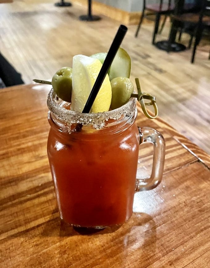 This isn't just a Bloody Mary—it's a meal in a glass with enough garnishes to count as your daily vegetable intake. Sunday brunch never looked so good.