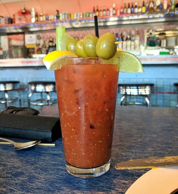 The Bloody Mary arrives like a meal in itself, crowned with olives and citrus—the perfect hair-of-the-dog remedy after a night exploring Philly.
