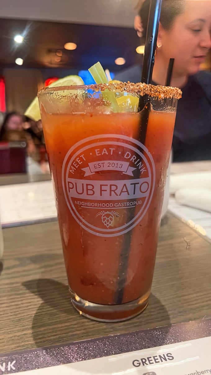 The Bloody Mary arrives properly dressed with vegetables that could constitute an entire salad, cocktail hour elevated.