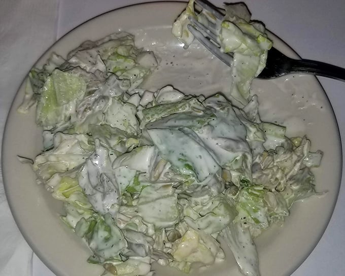 The blue cheese dressing isn't just a topping—it's practically a religion here, with chunks of cheese substantial enough to require a passport.