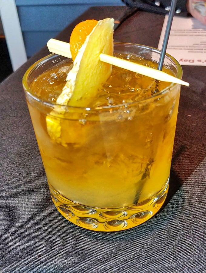 This isn't just a cocktail; it's liquid Kentucky sunshine. Garnished with citrus and served with enough ice to survive summer in Lexington.