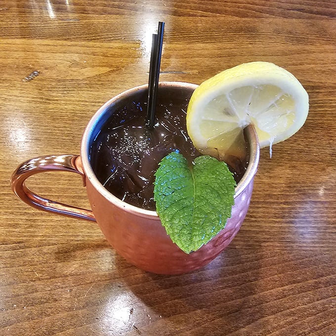 A copper mug Moscow Mule with fresh mint and lemon – because sometimes you need something bright and zippy to cut through all that smoky richness.
