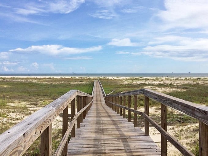 The boardwalk that promises paradise. Each weathered plank leads closer to where your worries dissolve into the horizon.