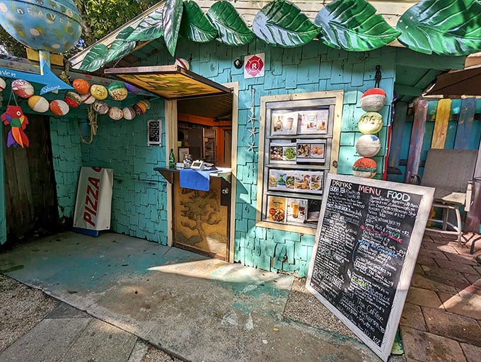 The turquoise café with its hand-painted menu board offers the kind of food that tastes better with sand between your toes.