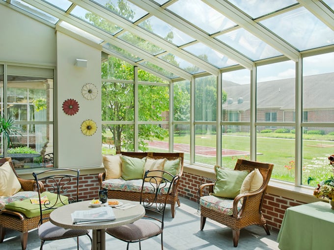 Sunrooms like this make Pennsylvania winters bearable—all the sunshine, none of the shoveling, and comfortable seating to boot.