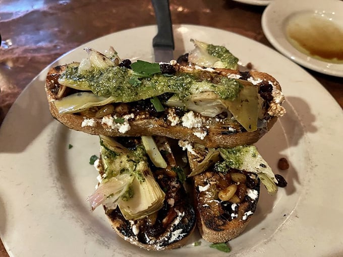Bruschetta towers reaching for greatness, proving that sometimes the simplest things make the biggest statements.