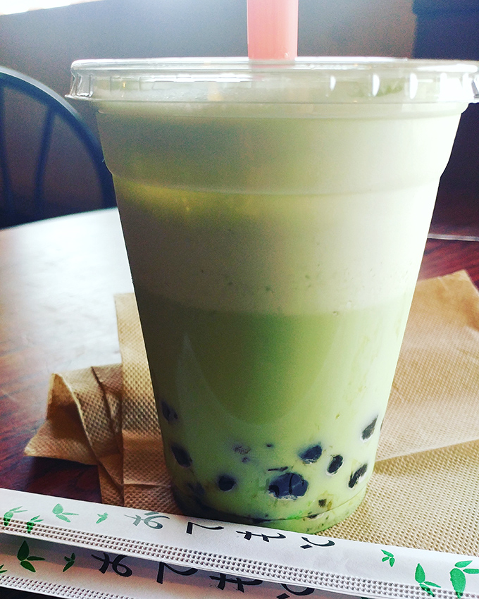 This isn't just bubble tea – it's a green matcha vacation in a cup, with chewy tapioca pearls playing the role of edible souvenirs.