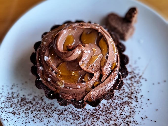 This chocolate tart doesn't just satisfy your sweet tooth—it writes it love poems and promises to call the next day.