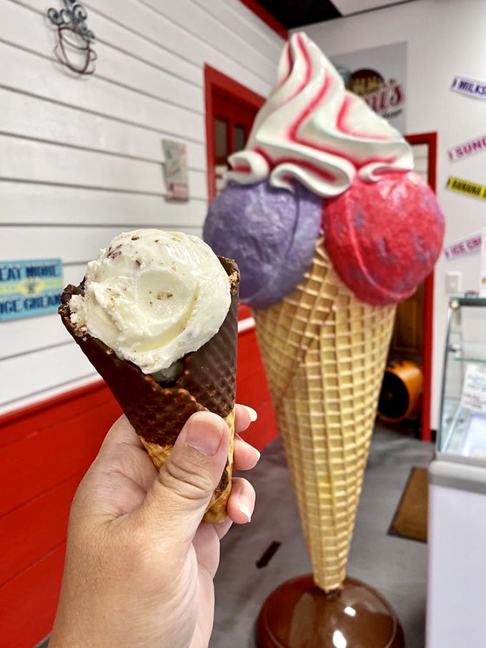 A perfectly swirled cone against the backdrop of Mimi's giant ice cream sculpture—it's like taking a selfie with a celebrity.