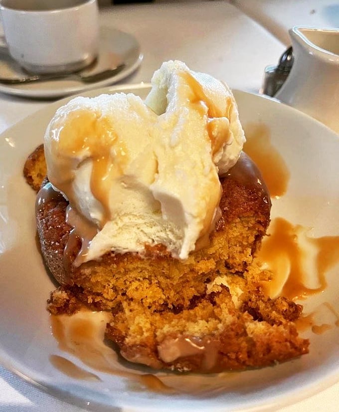 Butter cake with vanilla ice cream—proof that sometimes the simplest desserts create the most profound moments of silence at the table.
