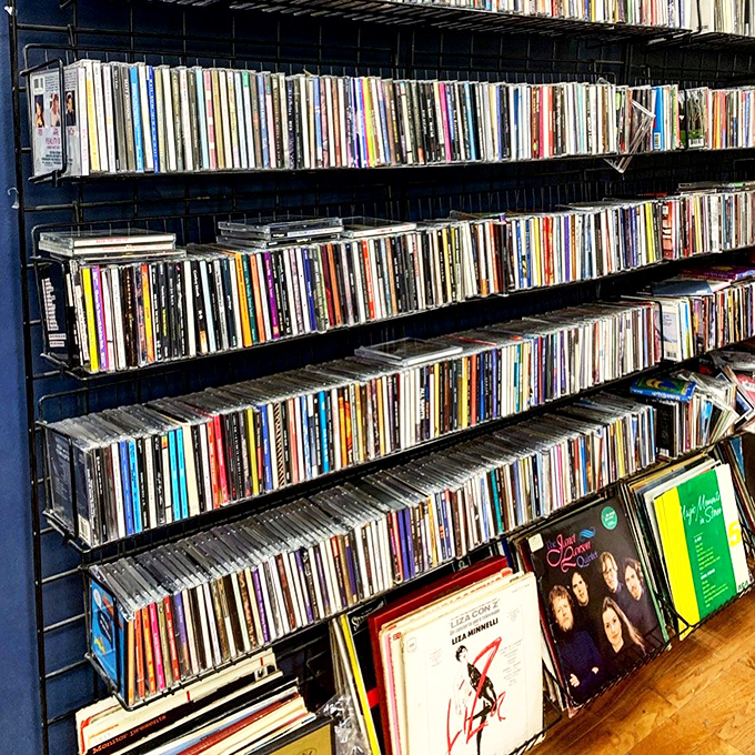 Vinyl paradise! Albums from every era create a physical timeline of music history, each record a portal to someone else's soundtrack.
