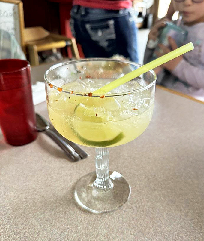 A margarita that doesn't just refresh—it resets your entire outlook on life, one salty-sweet sip at a time.