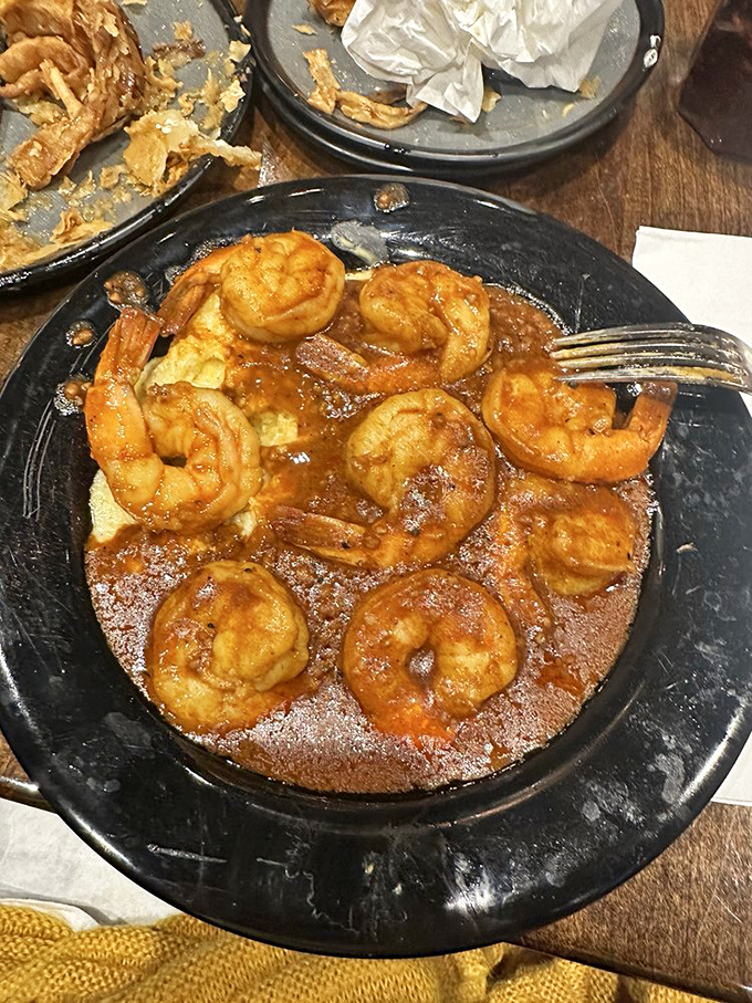 These Cajun shrimp aren't just swimming in sauce—they're doing the backstroke in flavor country, and we're diving in headfirst.