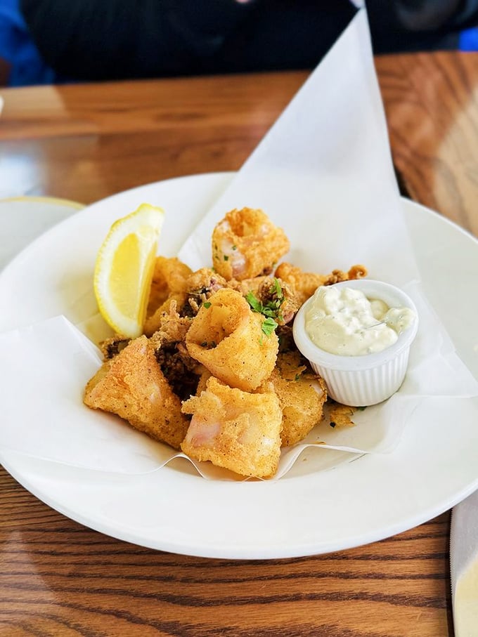 Golden-fried calamari that crackles with each bite—the seafood equivalent of potato chips, but infinitely more sophisticated.