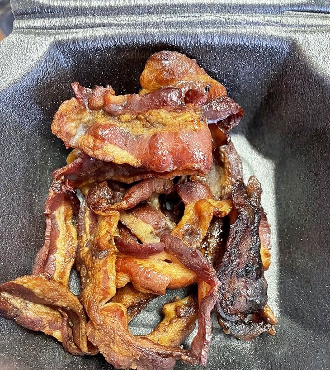 Candied bacon that bridges the gap between breakfast and dessert. Sweet, savory, and utterly irresistible—proof that even the simplest dishes can achieve cult status.