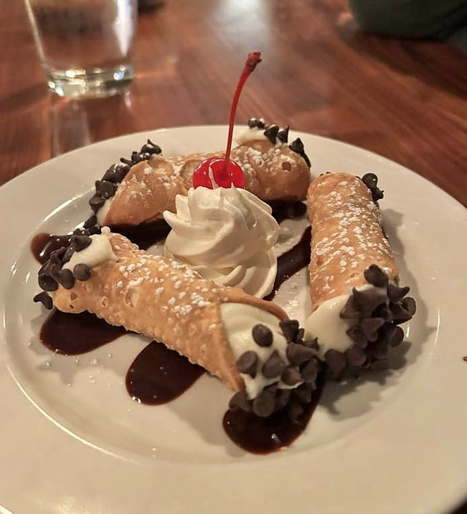 Cannoli that would make any Sicilian grandmother nod in approval – crisp shells, creamy filling, and chocolate chips for good measure.