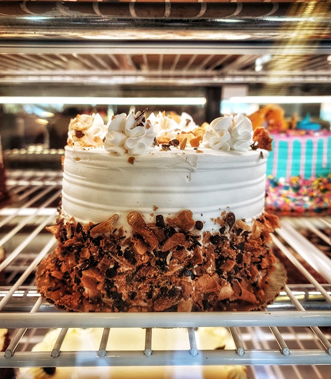 This cake isn't just wearing chocolate crumbles—it's flaunting them like a fashionista shows off a designer accessory. Edible couture at its finest.