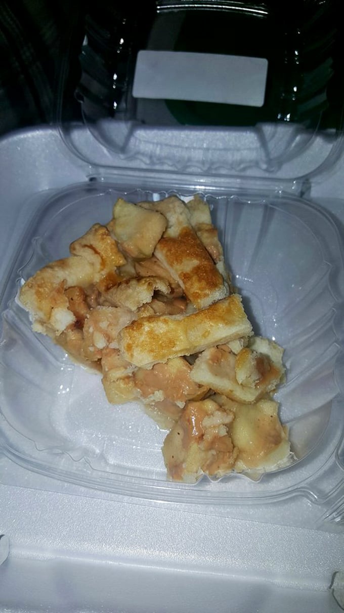 What appears to be apple pie filling nestled in flaky pastry—proof that BBQ Exchange understands that a proper meal needs a sweet finale.
