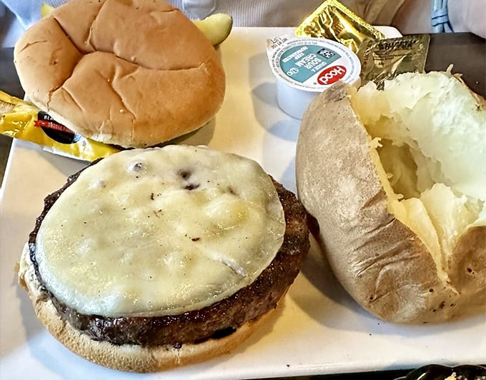 This isn't just a cheeseburger—it's what happens when steakhouse expertise decides to slum it with ground beef. Glorious rebellion.
