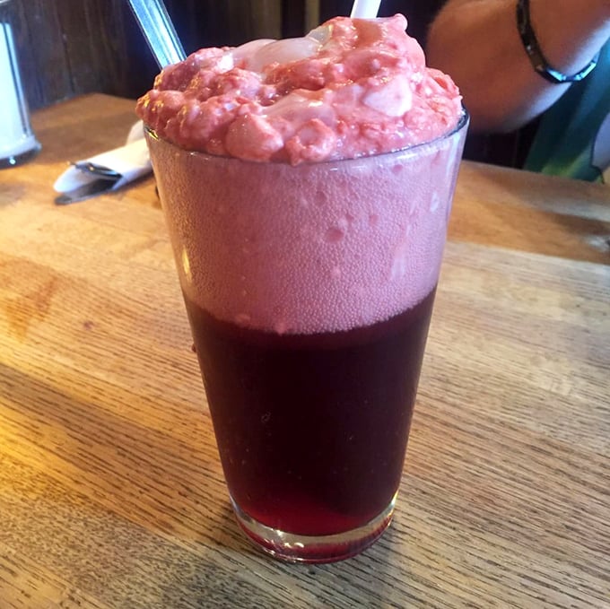 That cherry cola isn't just a drink—it's a frothy, fizzy time machine back to when soda fountains were social hubs and smartphones didn't exist.