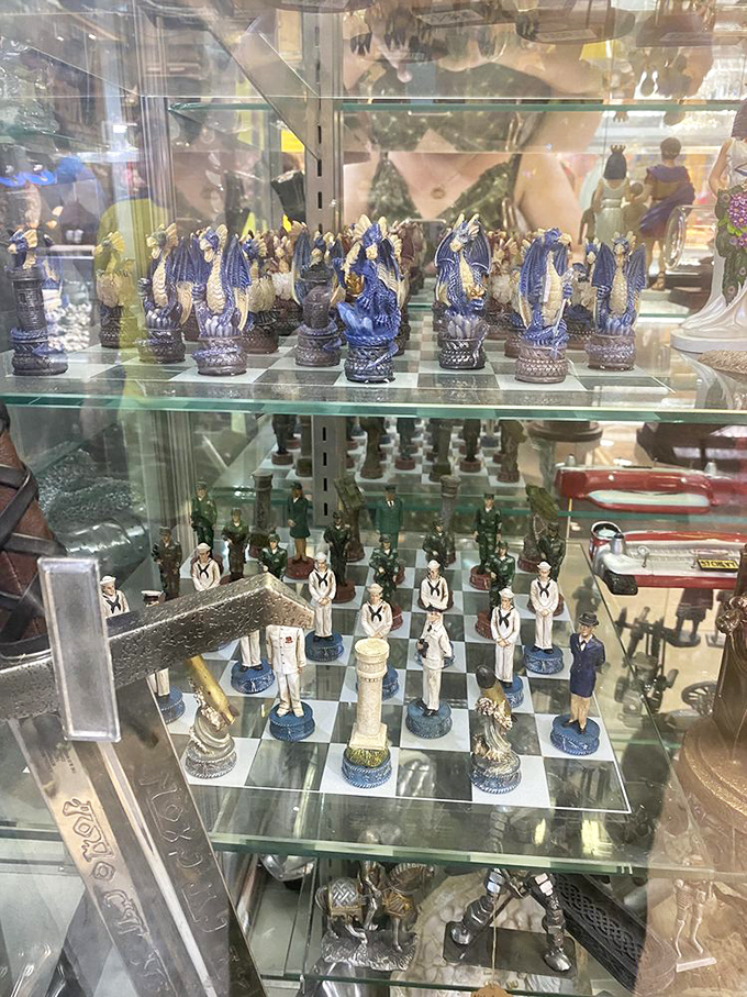 Decorative chess sets waiting patiently for someone to appreciate their artistry between the clothing racks and kitchen gadgets.