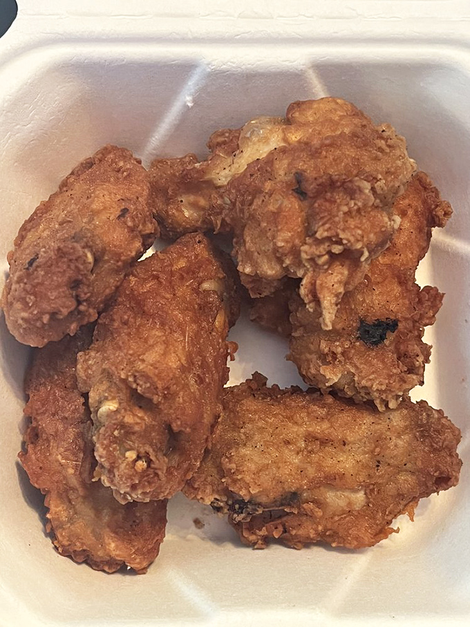 Fried chicken wings that make you wonder why humans evolved to have only two hands. More wings = more efficiency in this flavor delivery system.