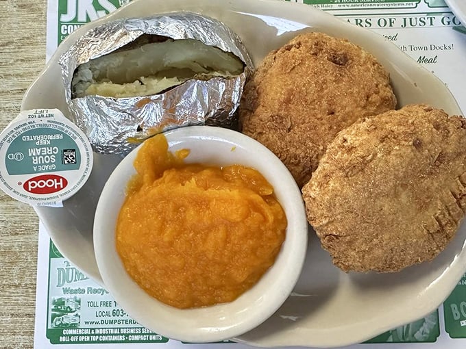 A baked potato, sweet potato mash, and chicken croquettes—the holy trinity of comfort food that would make your grandmother nod in approval.